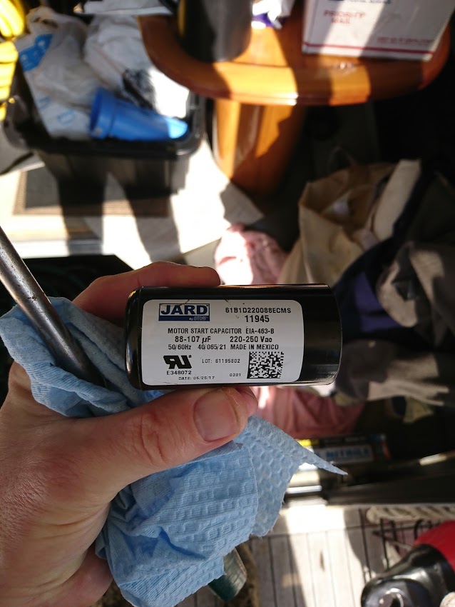 Barnacled air conditioning popping breaker | Trawler Forum